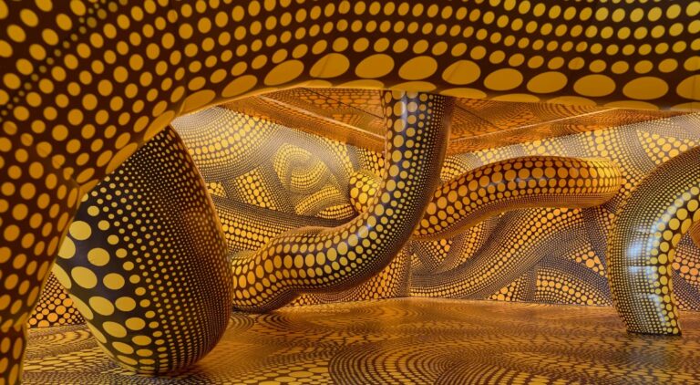 This retrospective of Yayoi Kusama features 300 pieces of art ...